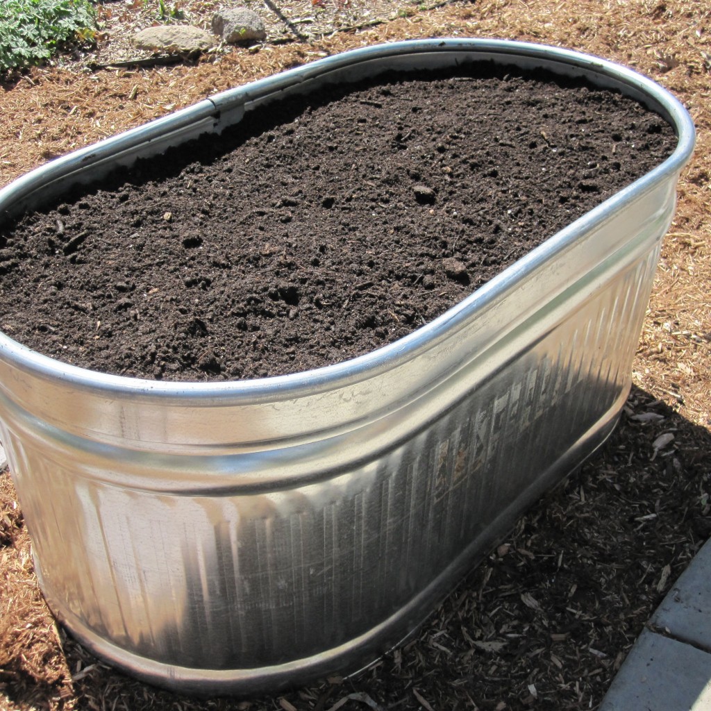Turning Cattle Troughs Into Raised Bed Gardens @ Livin' Thing